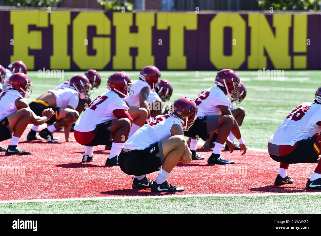 LOS ANGELES, CA - AUGUST 03: The team stretches during a USC Trojans ...
