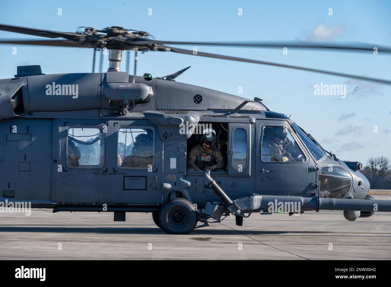 A 920th Rescue Wing HH-60G Pave Hawk helicopter taxis for take off from ...