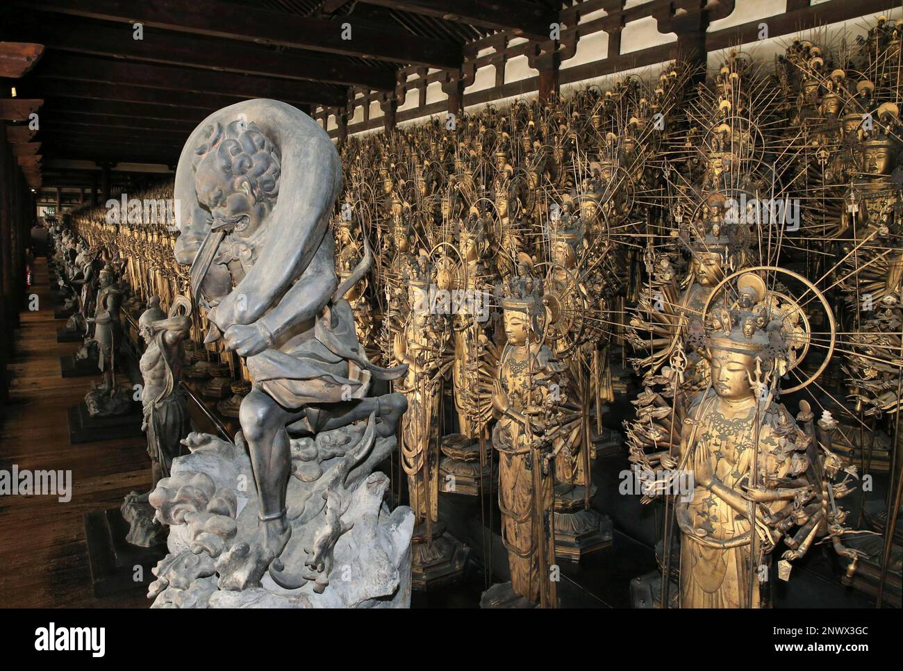 A photo shows the unveiled stature of Fujin (L),god of wind moved to ...