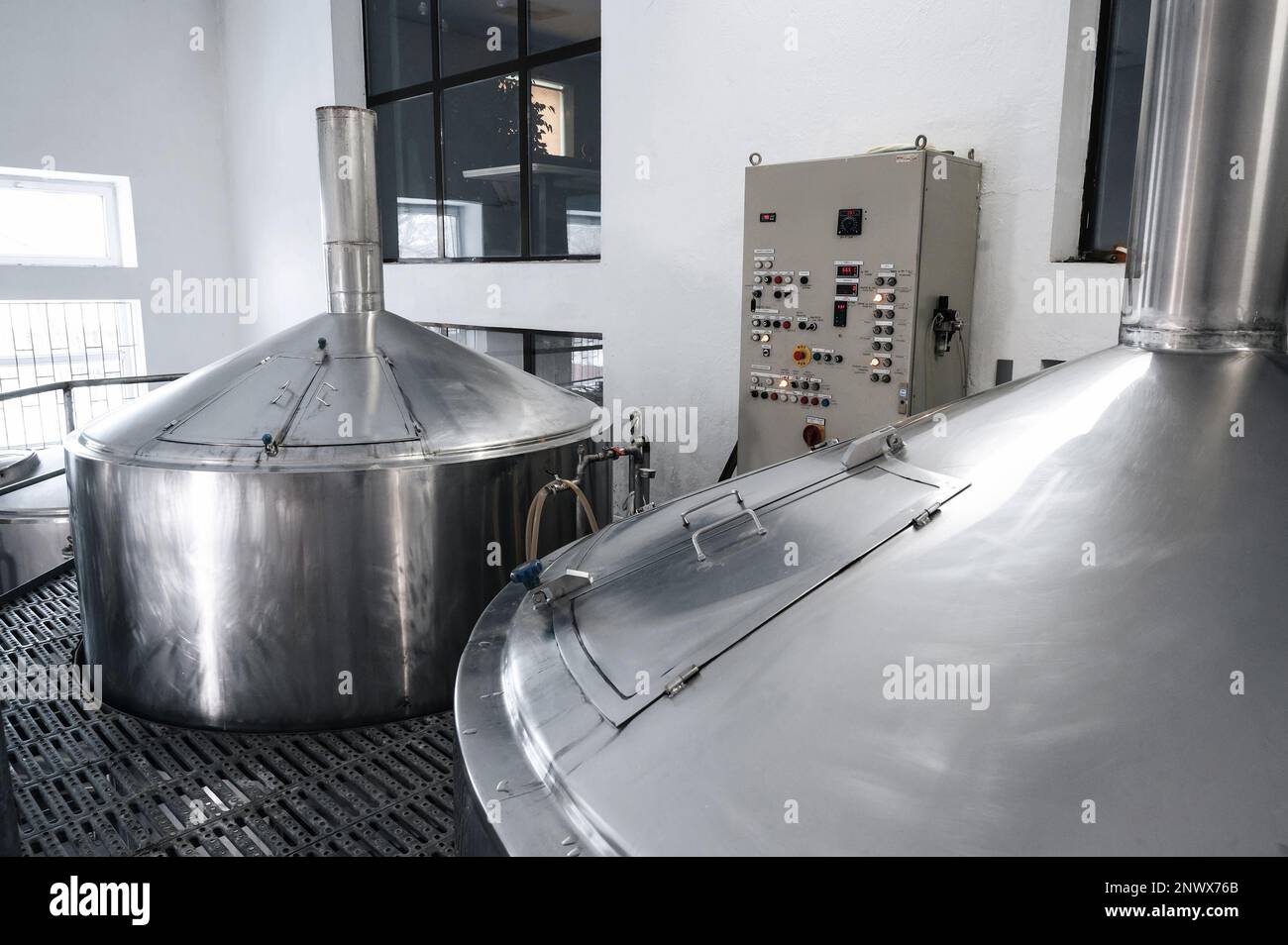 interior of a modern factory brewery with tanks inside Stock Photo - Alamy