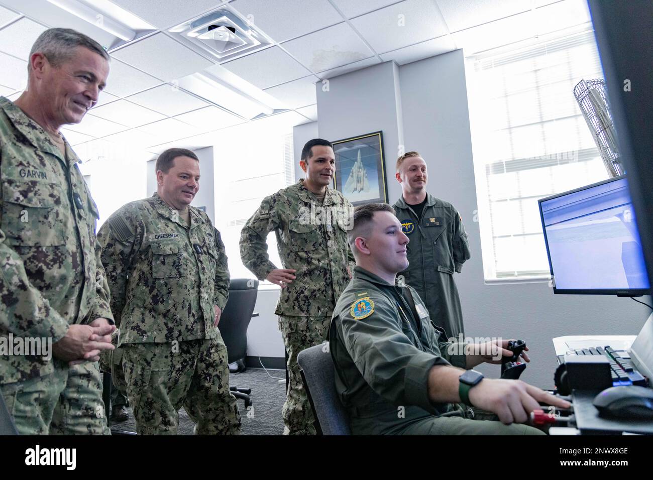 Chief of Naval Personnel Vice Adm. Rick Cheeseman, center-left ...