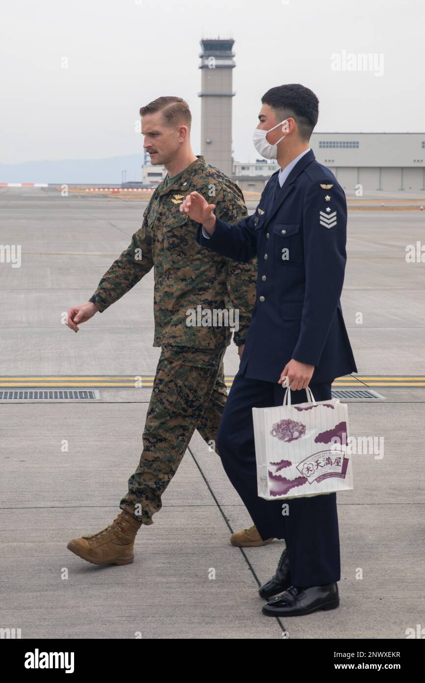A Japan Air Self-Defense Force cadet speaks with U.S. Marine Corps Lt ...