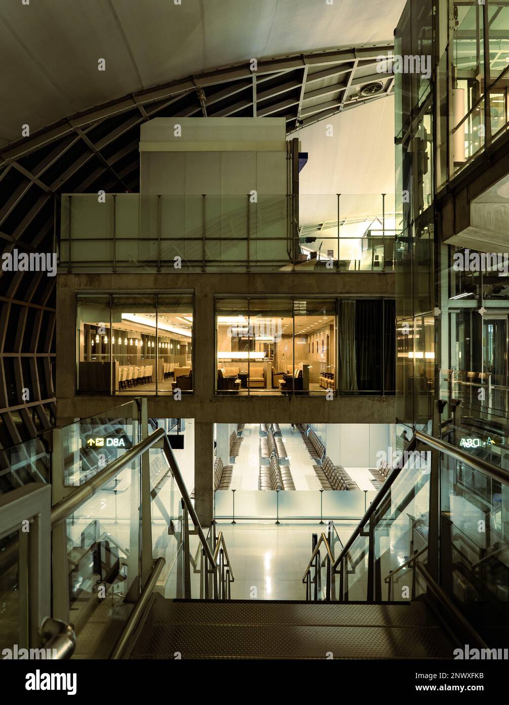 A nighttime view of the inside of an airport terminal Stock Photo - Alamy