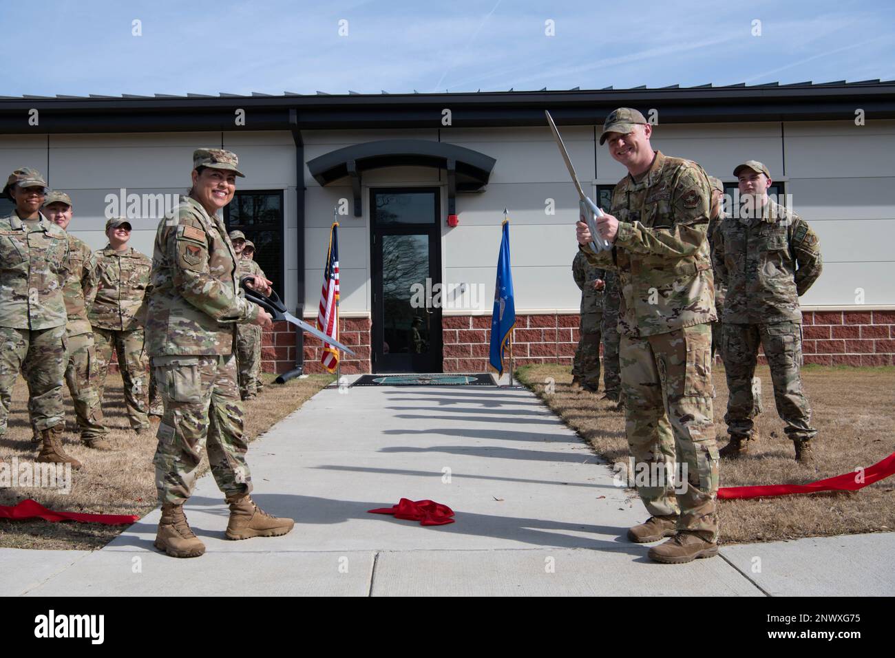 U.S. Air Force Col. Anadis Collado, 628th Medical Group commander, left ...