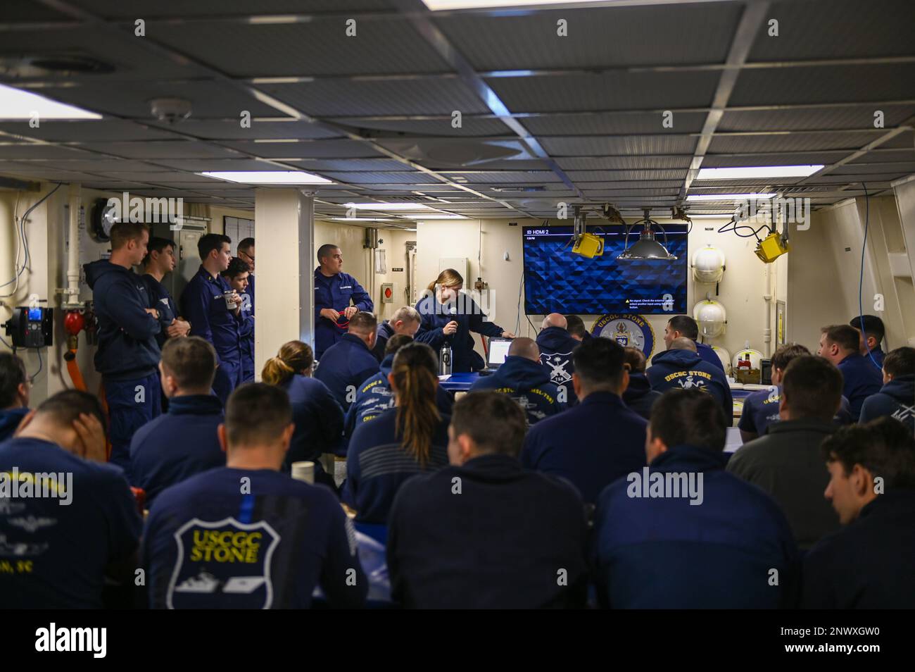 U.S. Coast Guard Ensign Samantha Bolin, a deck watch officer assigned ...