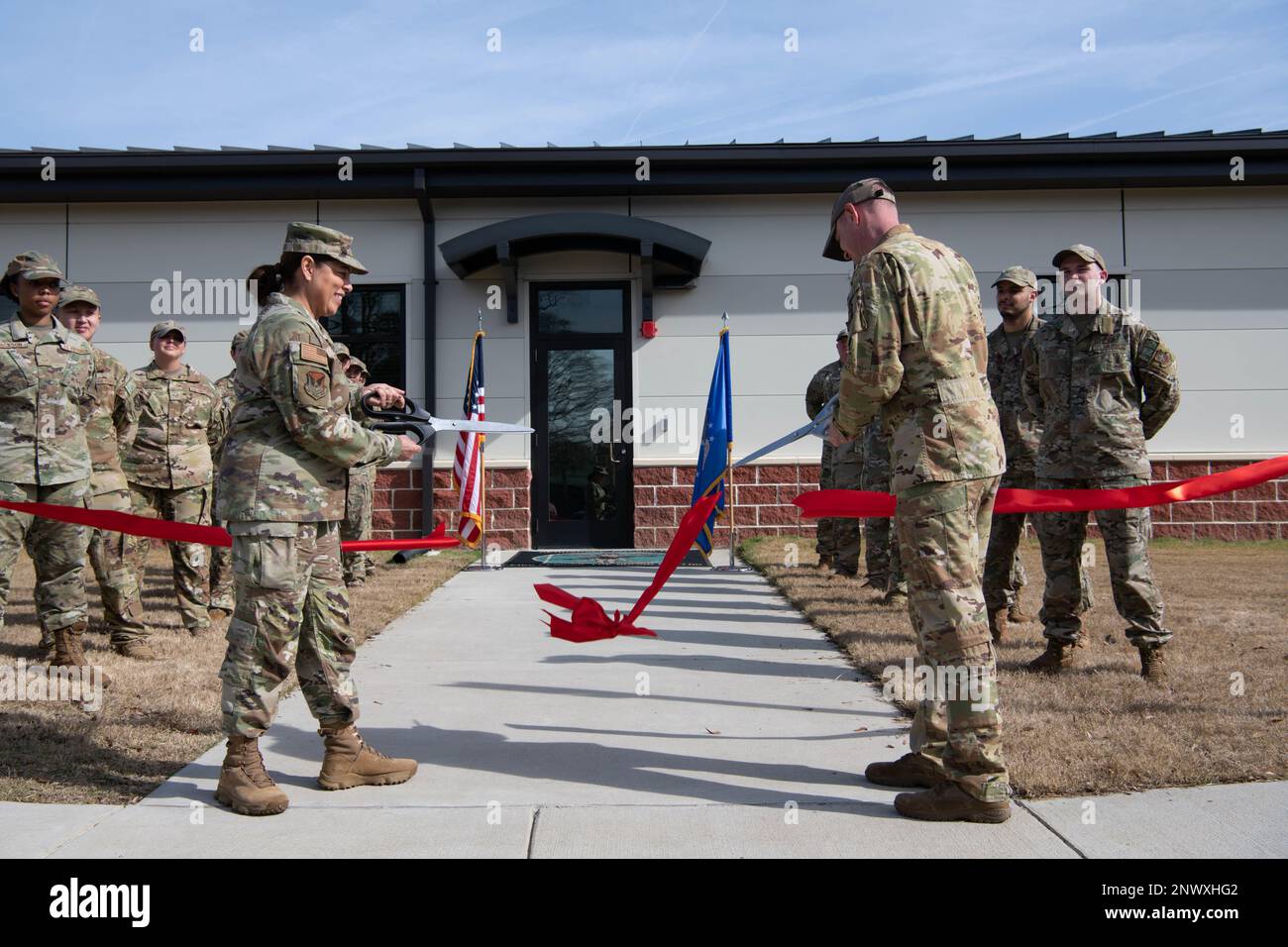 U.S. Air Force Col. Anadis Collado, 628th Medical Group commander, left ...