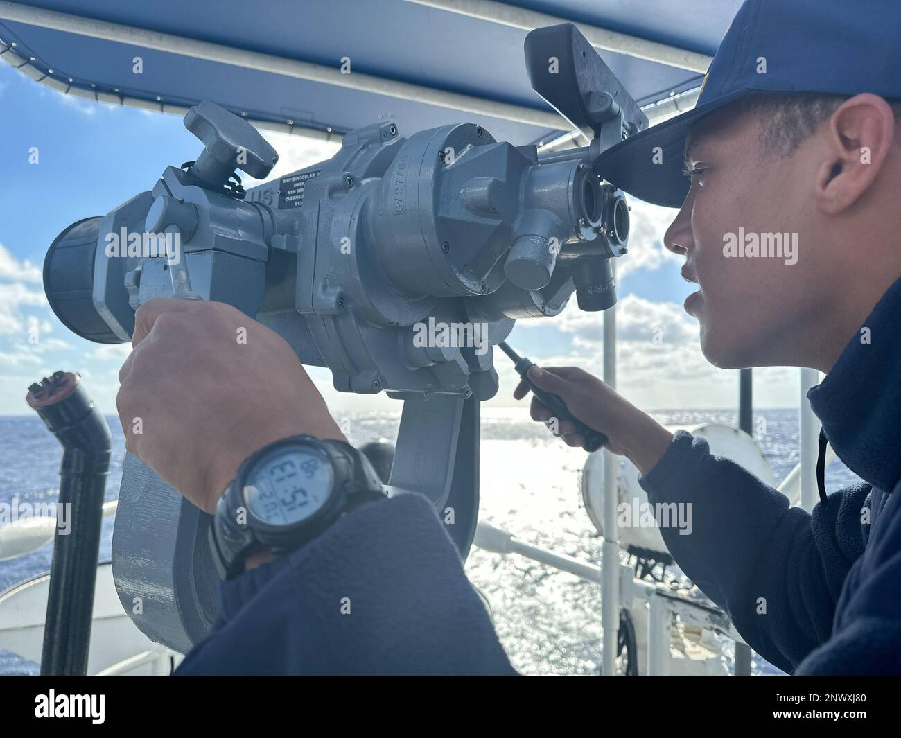 U.S. Coast Guard Seaman Apprentice Greyson Collins, a crew member ...