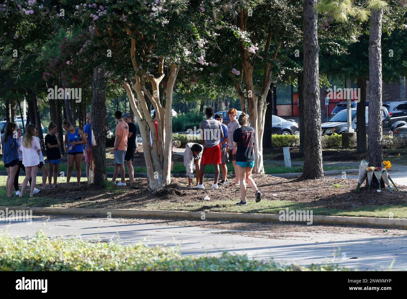 Students and friends of Salma Gomez and Chloe Robison gather at a small memorial near the site ...