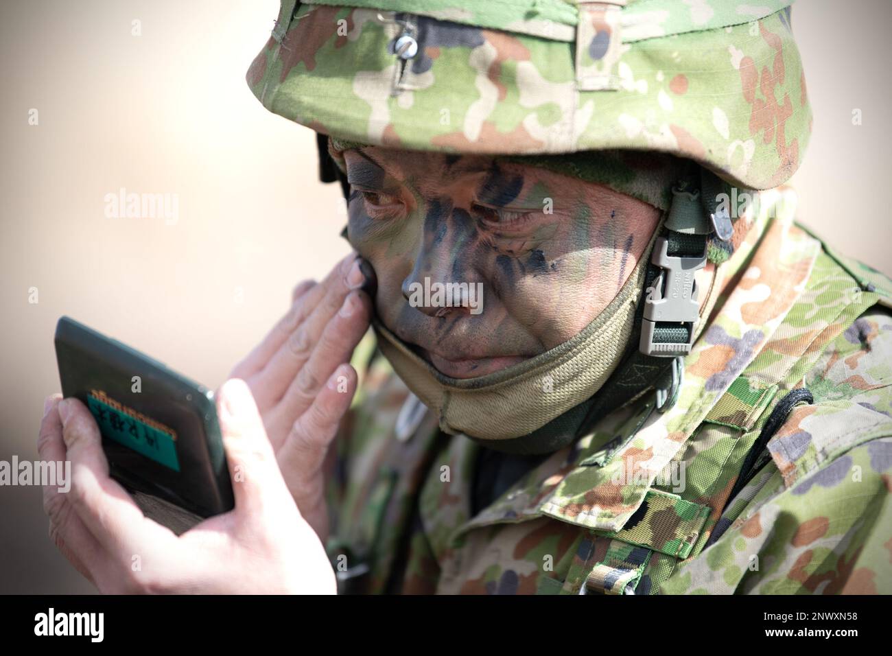 A Japan Ground Self-Defense Force paratrooper assigned to the 1st ...