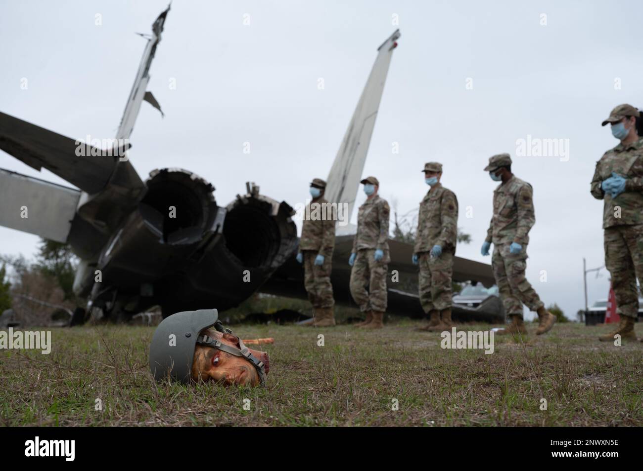 U.S. Airmen with the 325th Force Support Squadron perform a search and ...