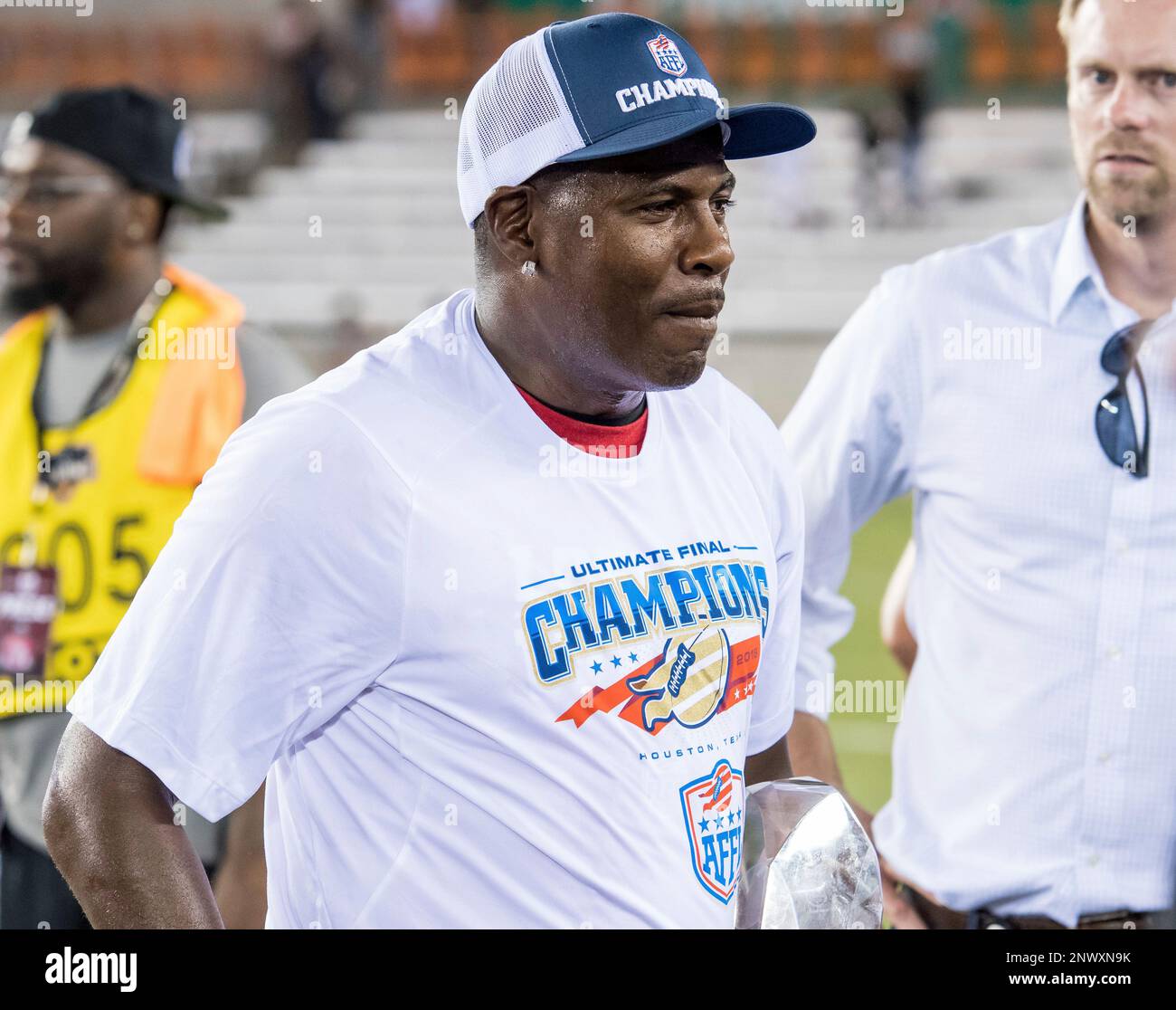July 19, 2018: Fighting Cancer coach Stephon Johnson carries the trophy ...