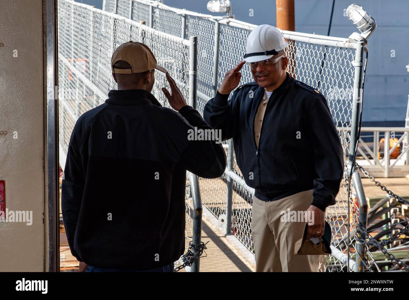 Retired U.S. Army Chief Warrant Officer 5 Phillip Brashear meets with the crew of the Wasp-class ...