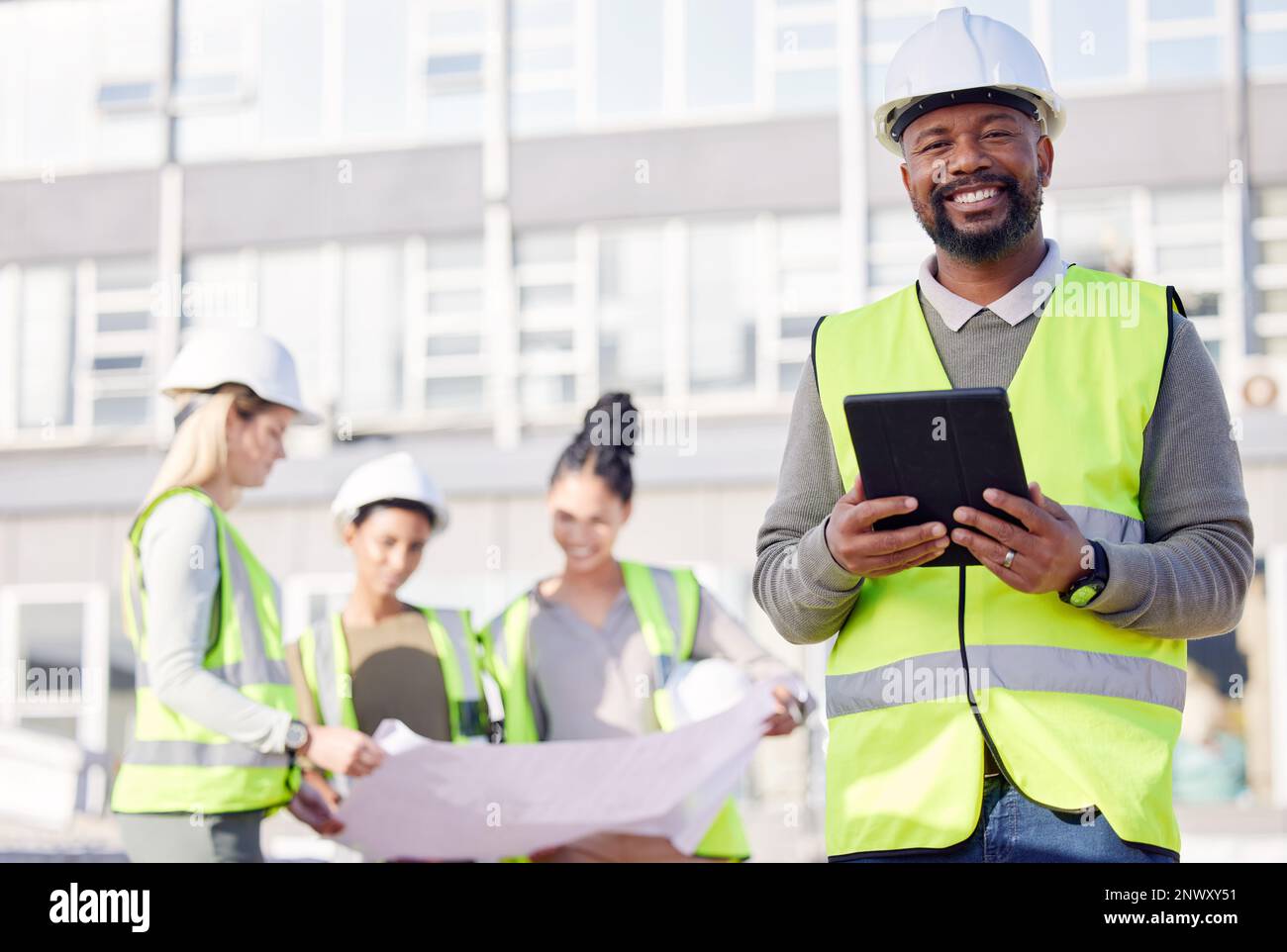 Architect, leader and black man construction worker with tablet, smile ...
