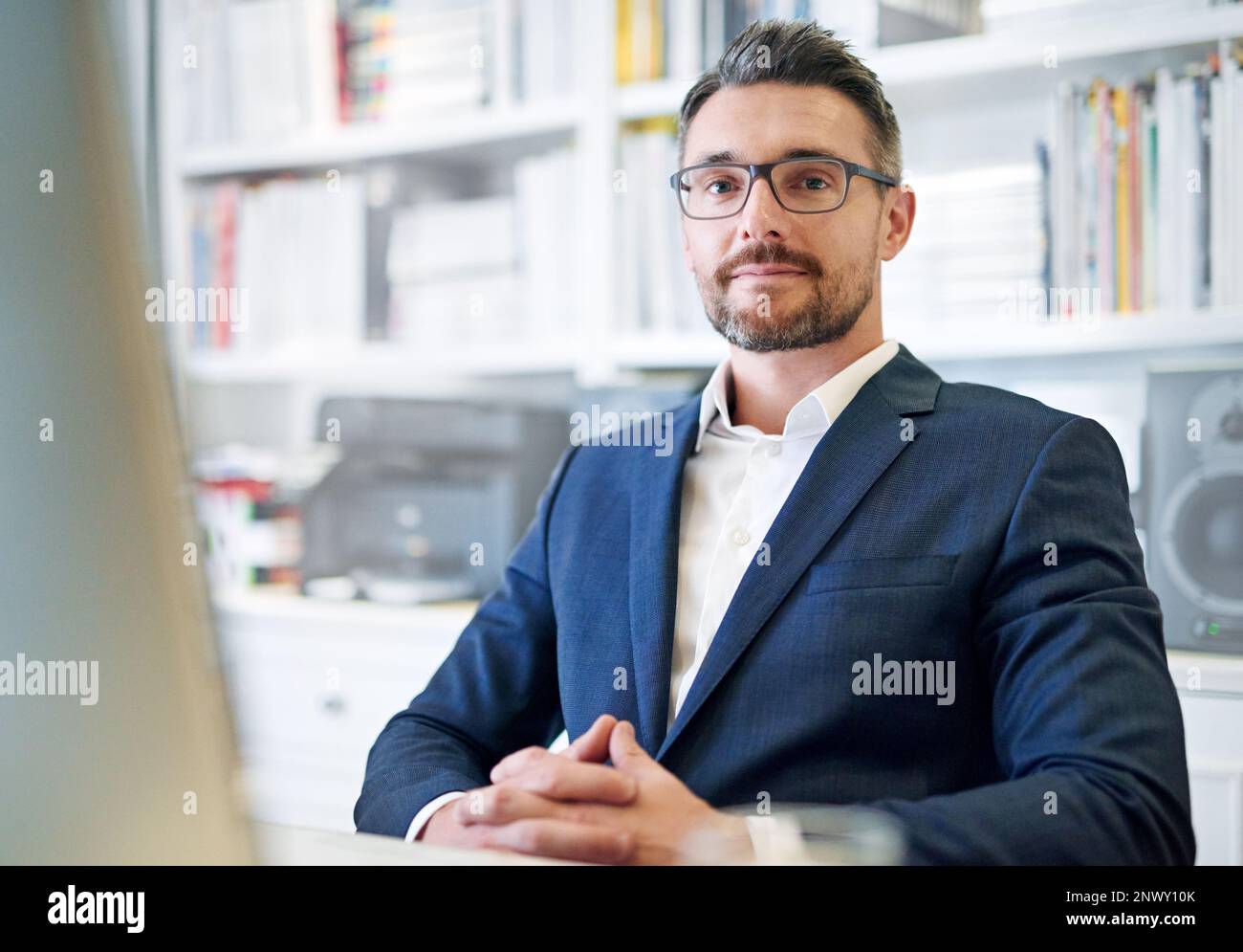 Hes really good at his job. a businessman in his office Stock Photo - Alamy