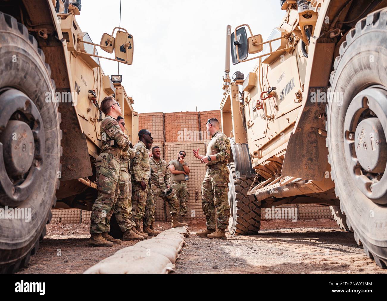 U.S. Army soldiers discuss equipment during an electronic warfare ...