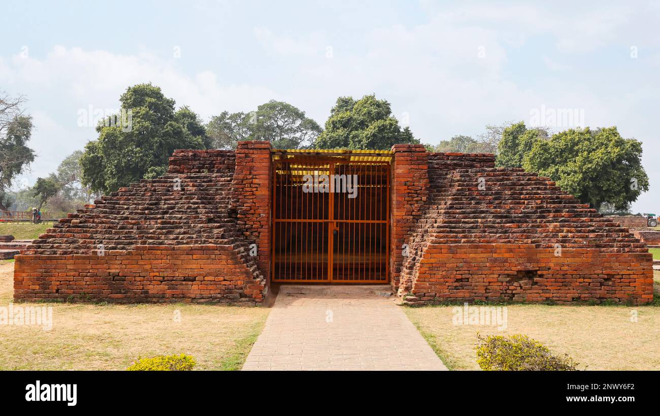 INDIA, BIHAR, NALANDA, February 2023, Tourist at small ruined temple in ...