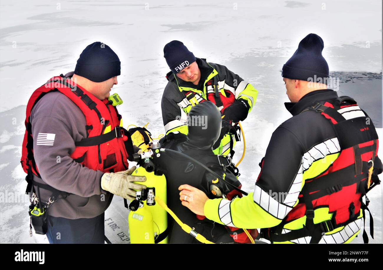 Firefighters with the Directorate of Emergency Services Fire Department ...