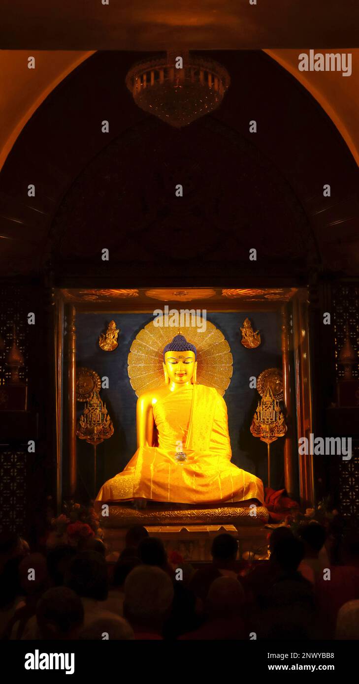 INDIA, BIHAR, BODH GAYA, January 2023, Devotee at Mahabodhi Temple with ...