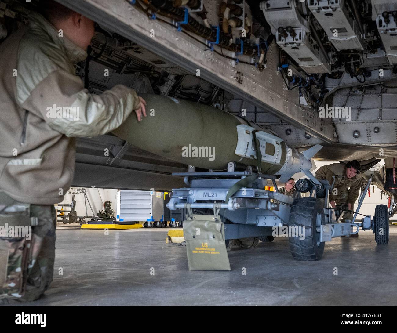 Senior Airman Hunter Brooks, 43rd Fighter Generation Squadron, guides a ...