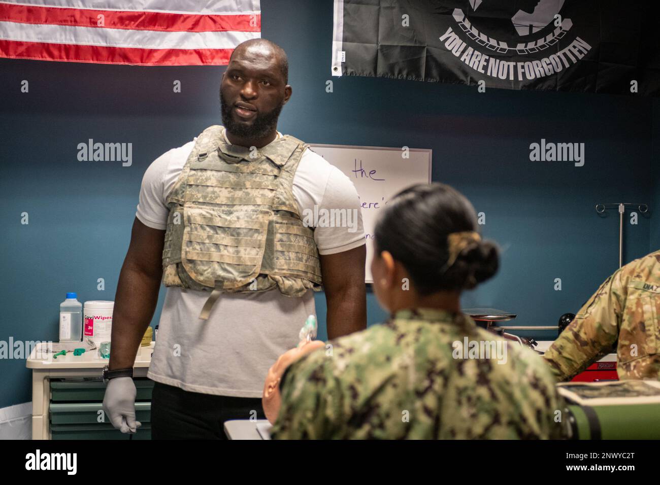 WWE Superstar Omos participates in hands-on respiratory training at the ...