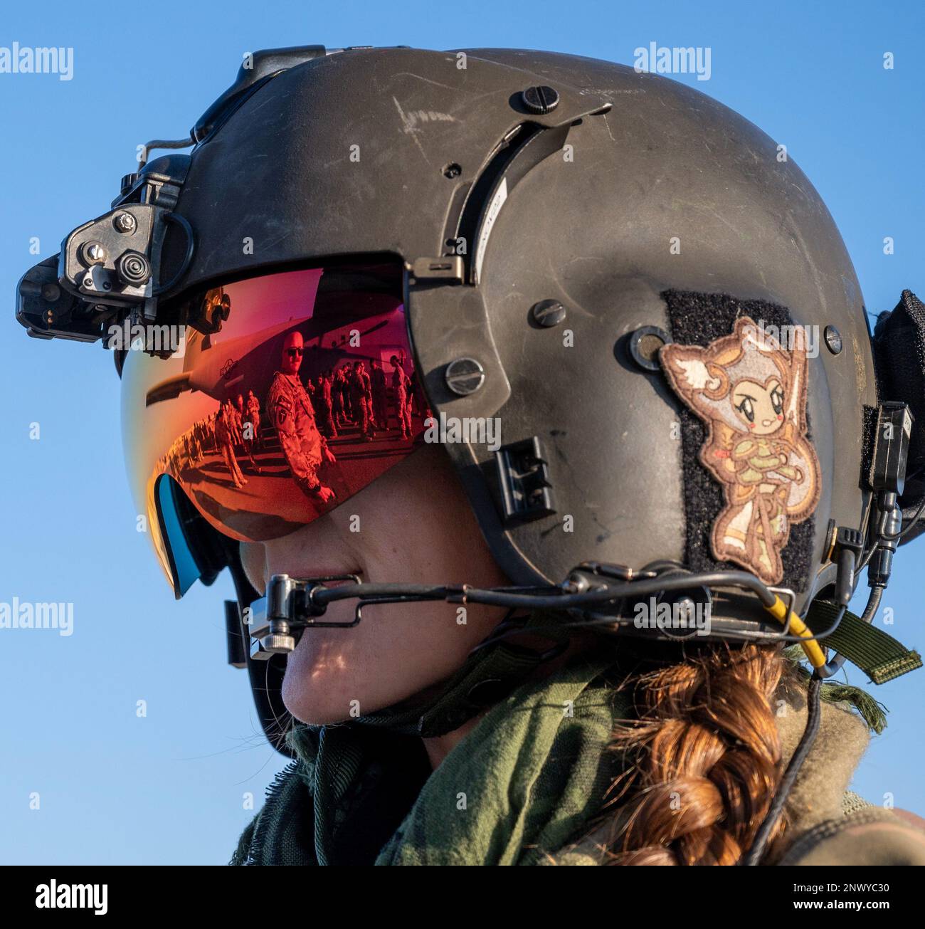 A U.S. Army Blackhawk helicopter crew chief watches as Airman, Soldiers ...