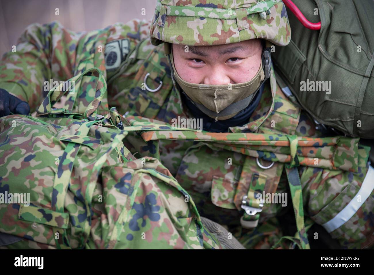 A Japan Ground Self-Defense Force paratrooper assigned to the 1st ...
