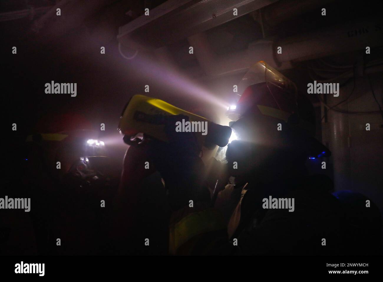 Boatswain’s Mate Seaman Brendan Bailey operates a Naval Firefighting ...