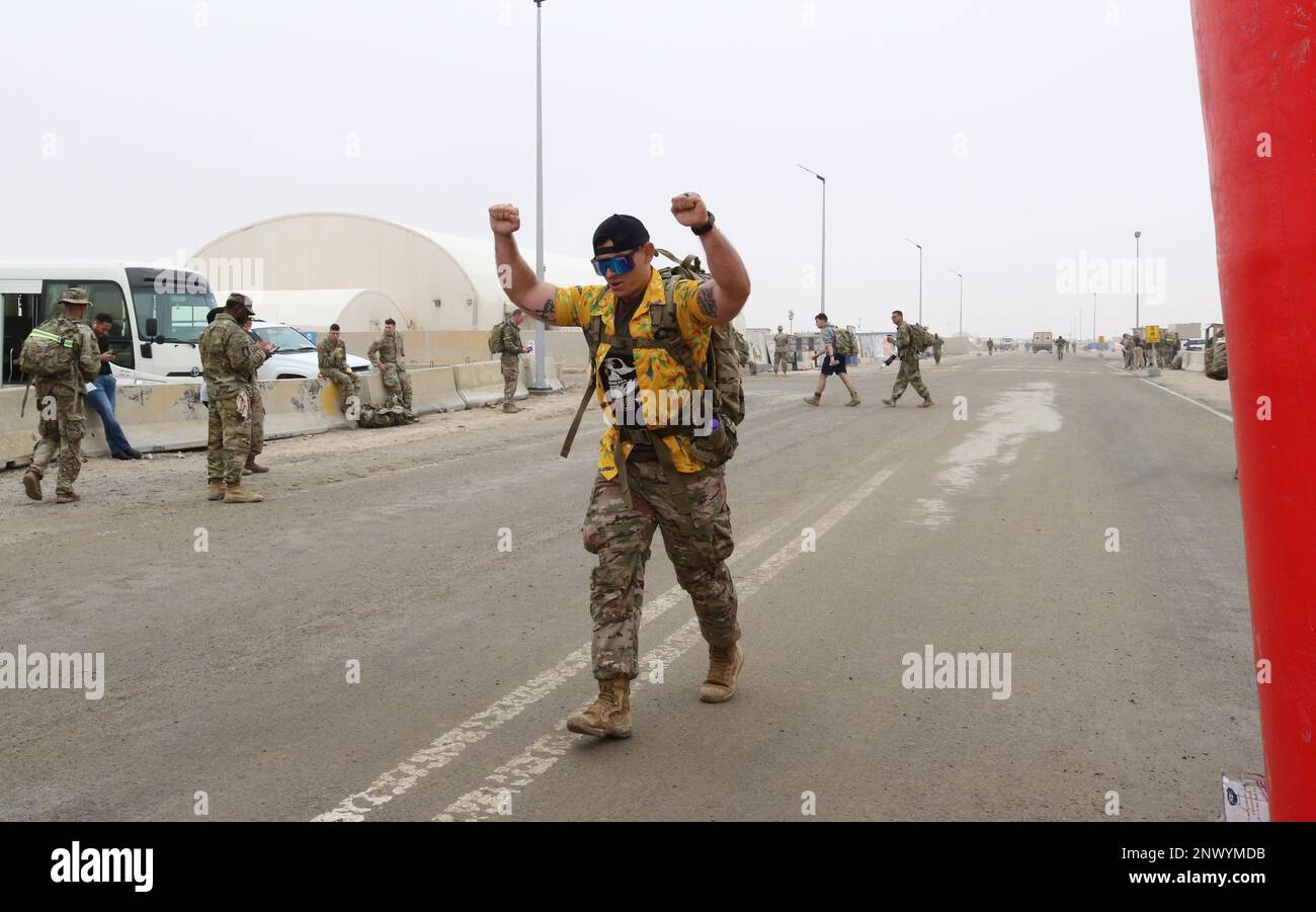 A U.S. Soldier crosses the finish line during the Danish Contingent ...