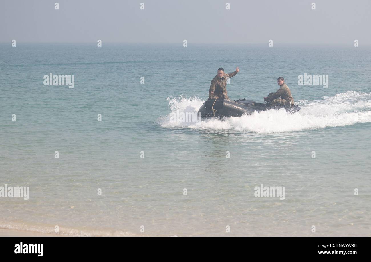 U.S. Army Soldier Sgt. 1st Class Zachary Holder (left), master diver ...