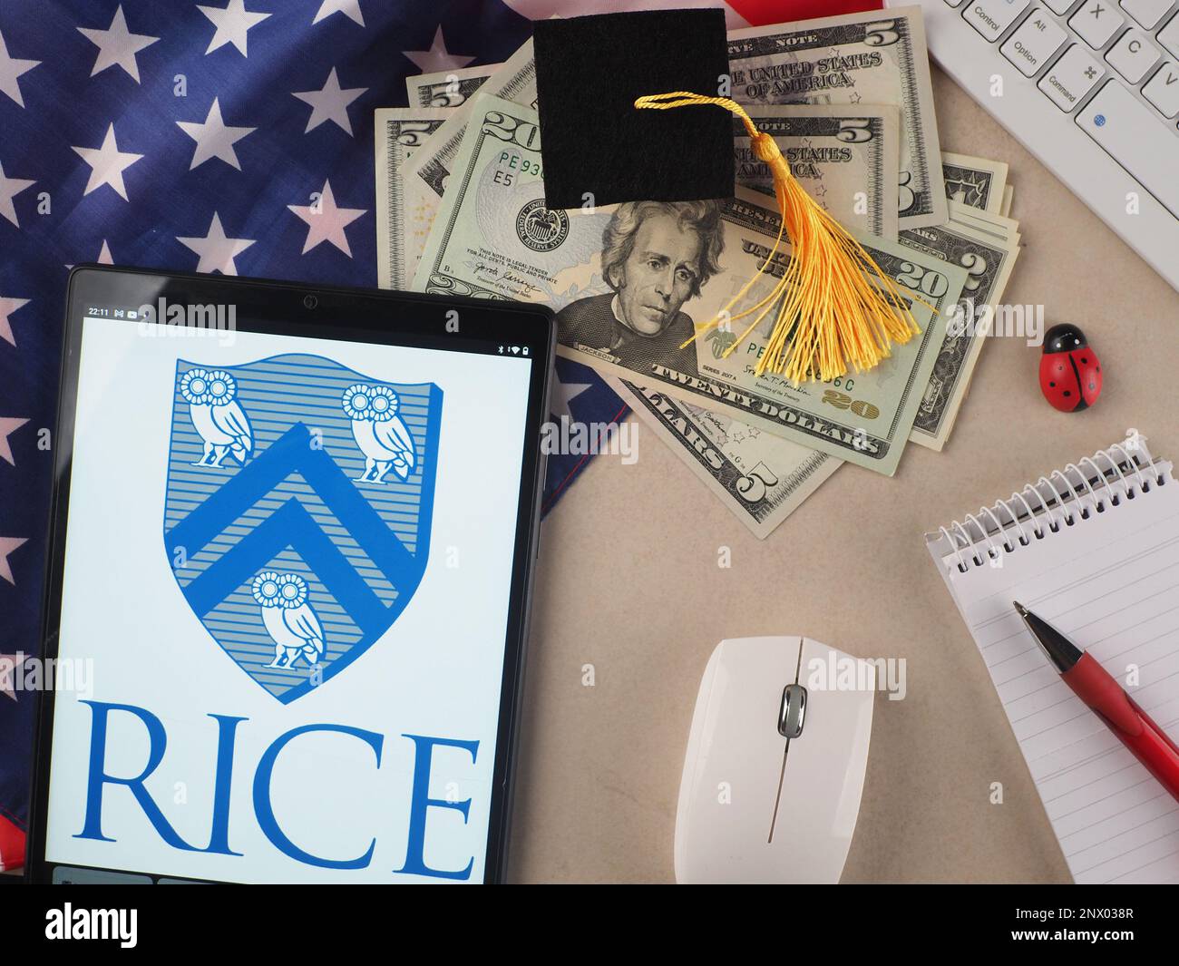 In this photo illustration, Rice University logo seen displayed on a ...