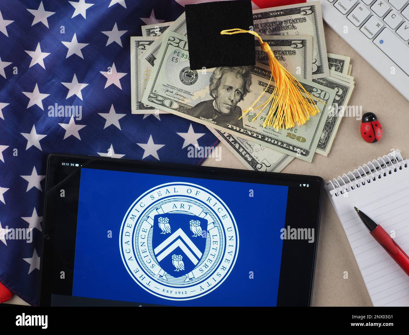 In this photo illustration, Rice University logo seen displayed on a ...