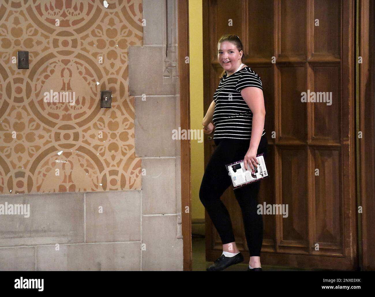 Haley Bronson, 14, of Archbald, Pa., smiles as she makes an exit stage ...