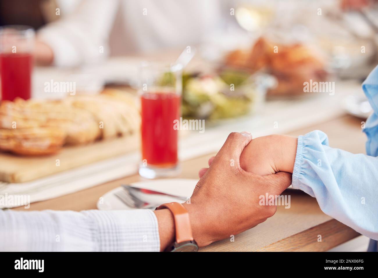 Appreciation, lunch and family holding hands for prayer, gratitude and ...