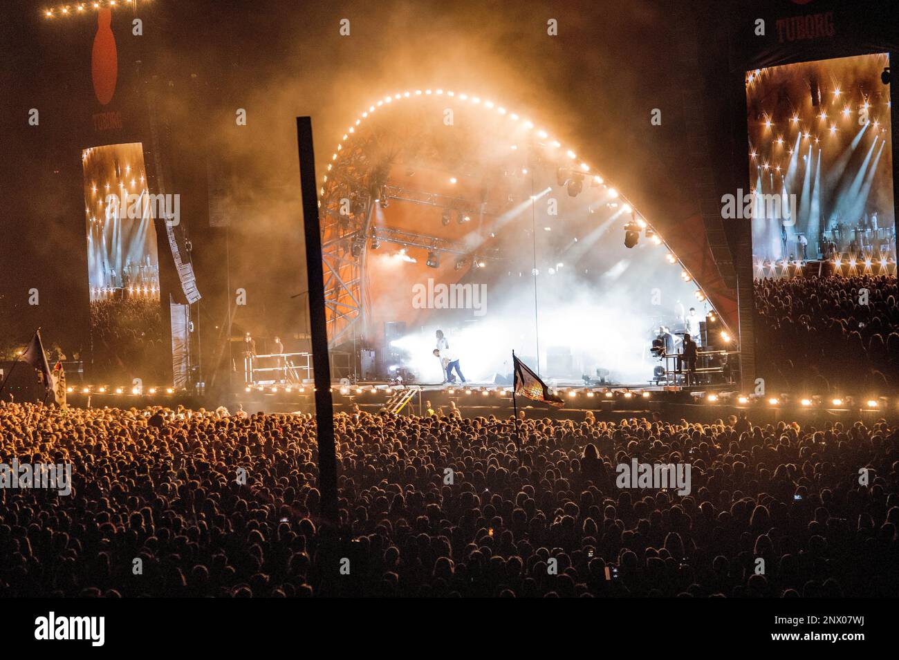 In this July 7, 2018 photo, Damon Albarn, center, looks over the edge ...
