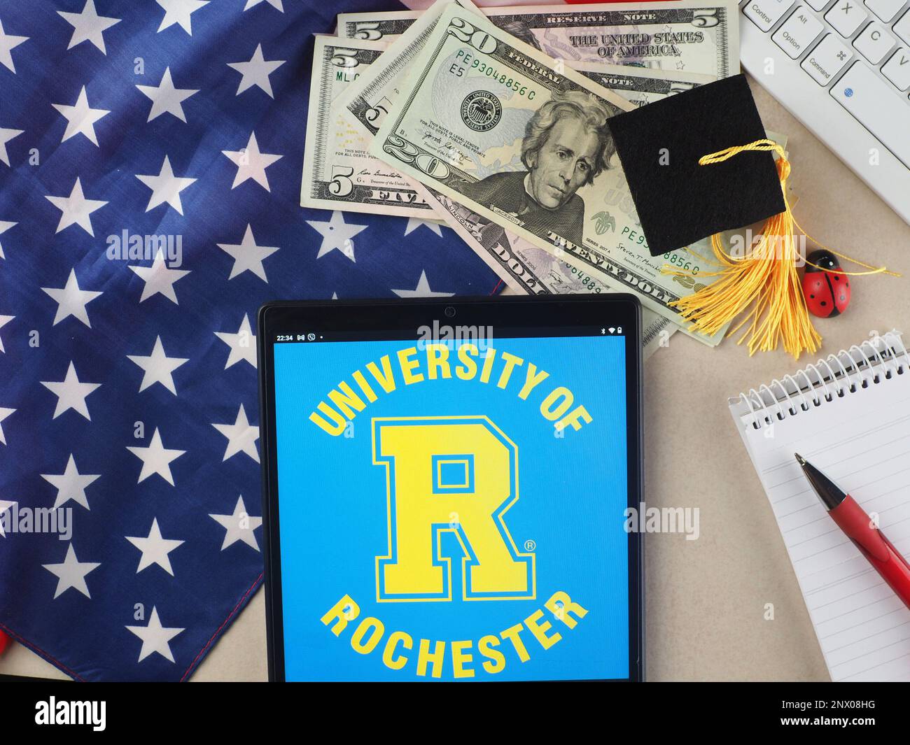 In this photo illustration, University of Rochester logo seen displayed ...