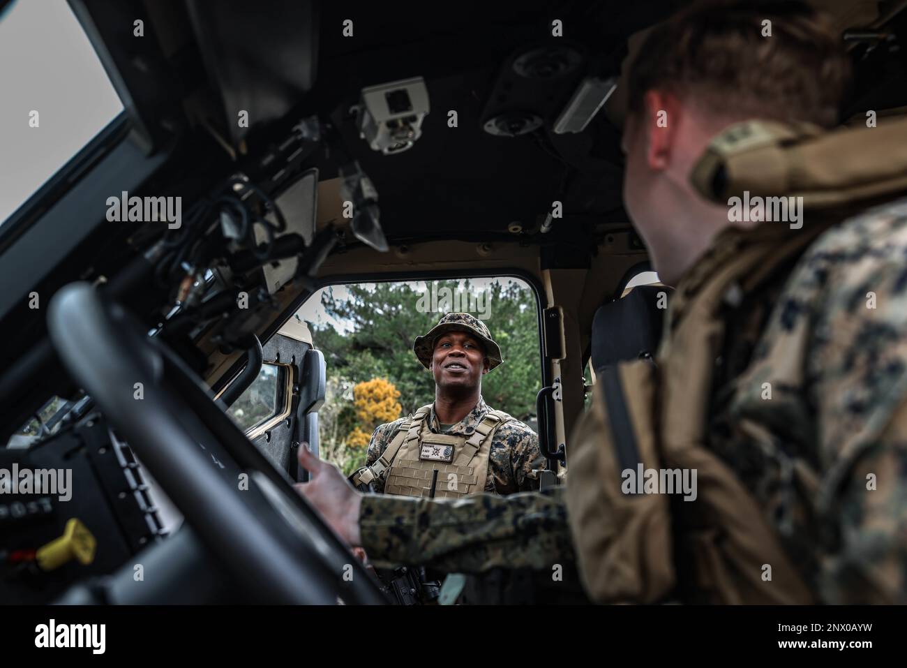 U.S. Marine Corps Staff Sgt. Jacquez Freeman, a watch chief, and Lance ...