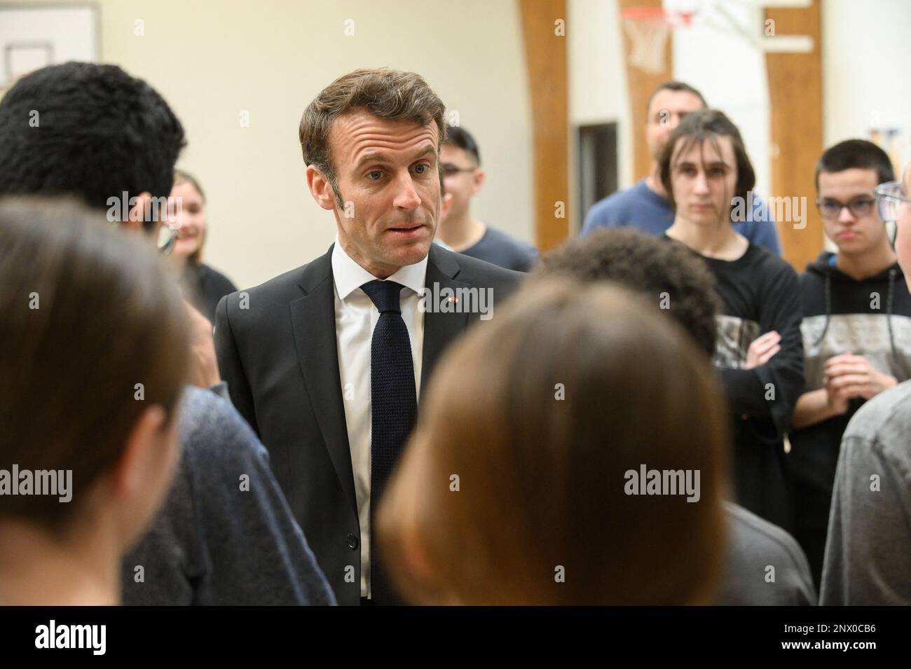 Jarnac, western France, on February 28, 2023. President Emmanuel Macron pictured in a classroom ...