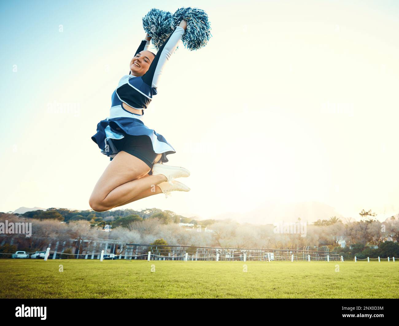 Cheerleader jump hi-res stock photography and images - Alamy