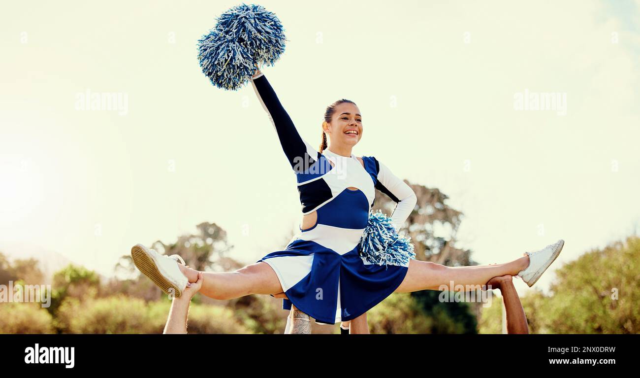 Cheerleader, sky and sports woman performance with smile and energy to ...