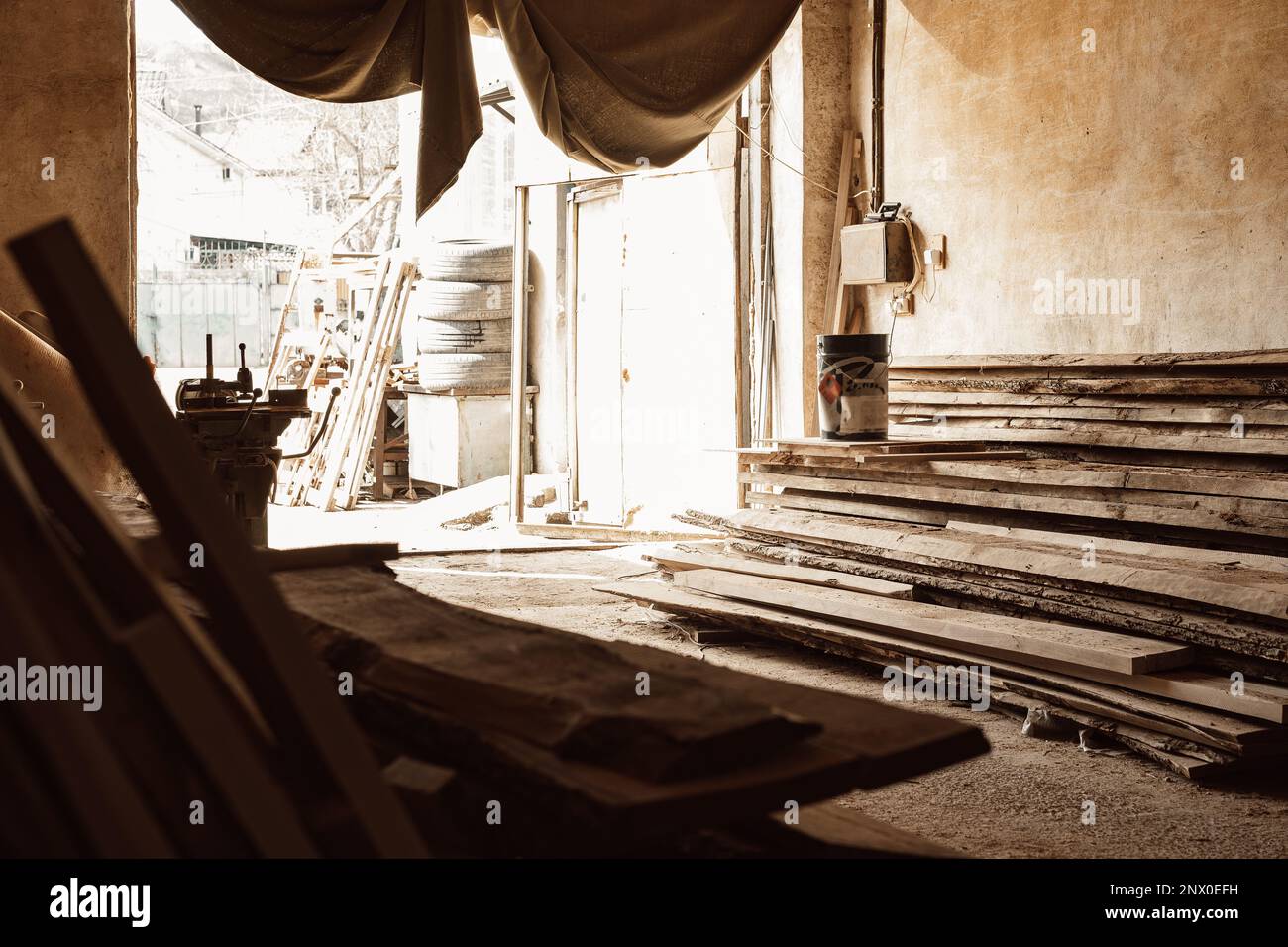 Pile of wooden boards in carpenter's shop Stock Photo - Alamy