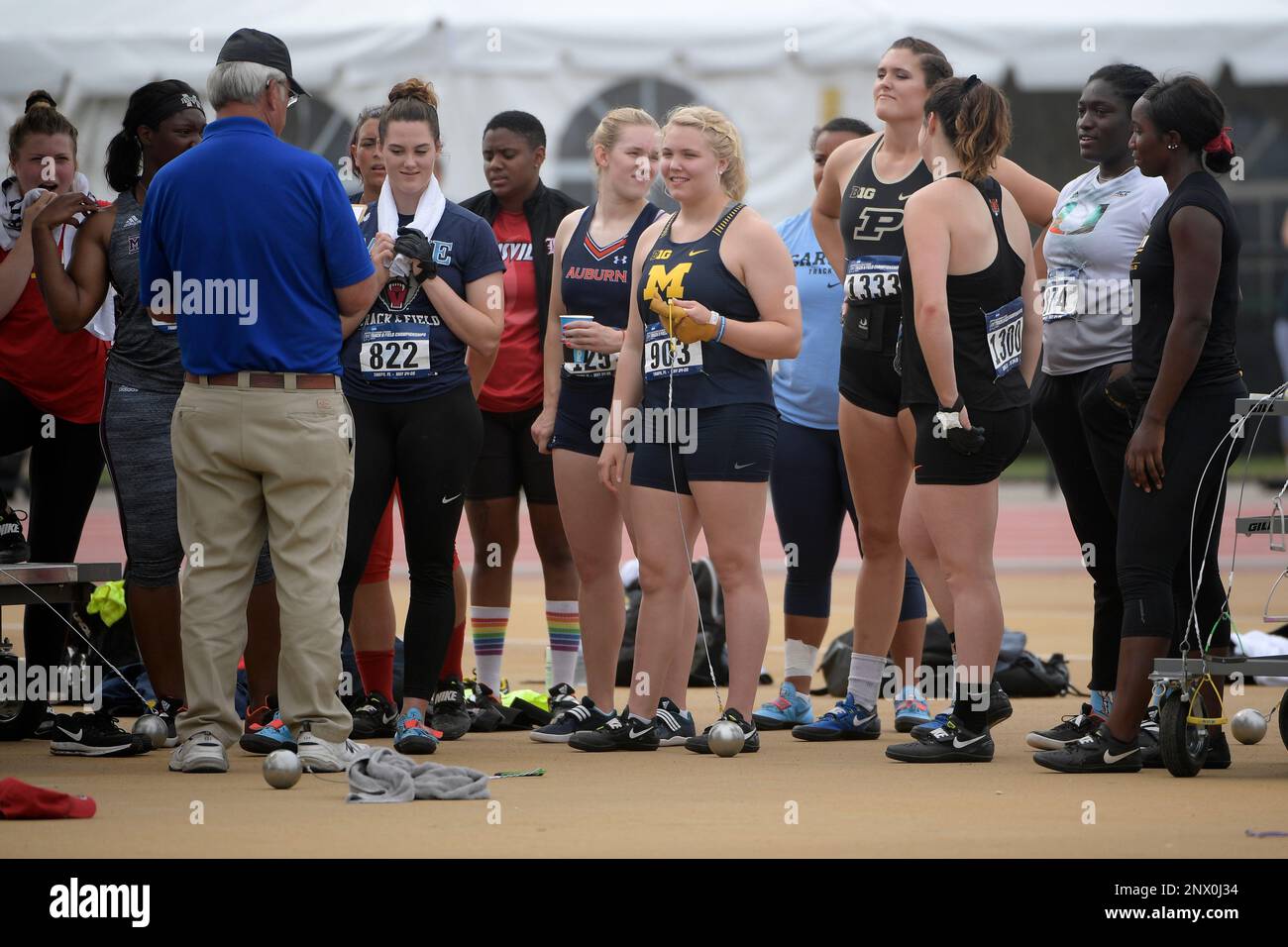 Michigan's Courtney Jacobsen (903) listens to instructions before ...