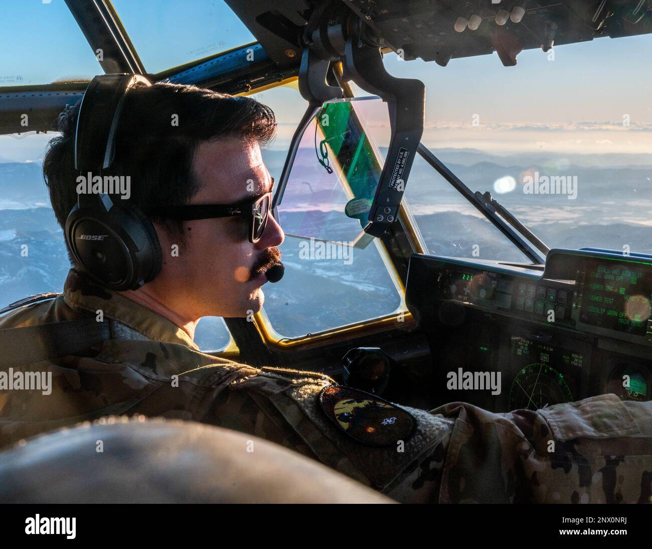 U.S. Air Force Capt. Kyle Buehler, 37th Airlift Squadron pilot, flys a ...