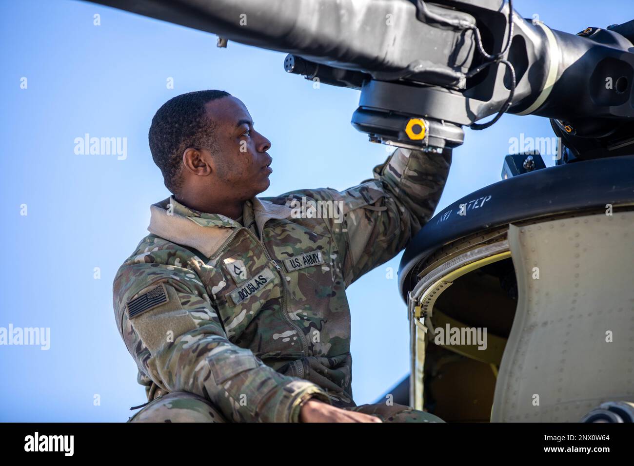 A U.S. Army CH-47 Chinook Crew Member assigned to 3rd Battalion, 501st ...
