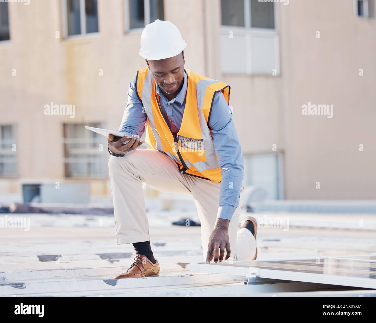 Black man, engineer tablet and solar panel grid installation of ...
