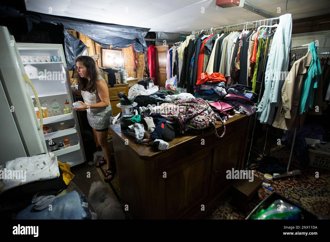 In this June 28, 2018, photo, Amy Slaughter gets a bottle of water in ...