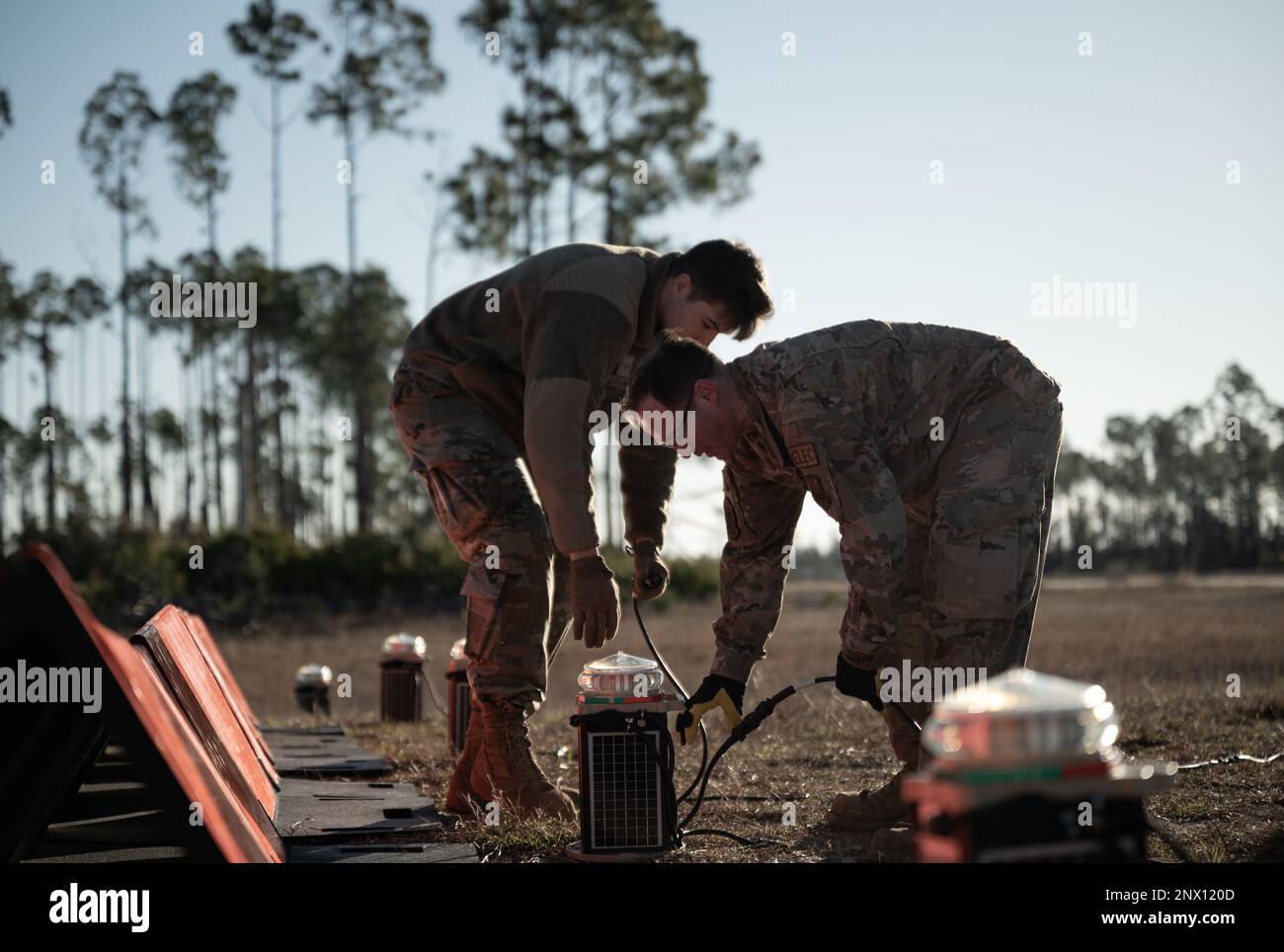 U.S. Airmen assemble an Expeditionary Airfield Lighting System (EALS-C ...