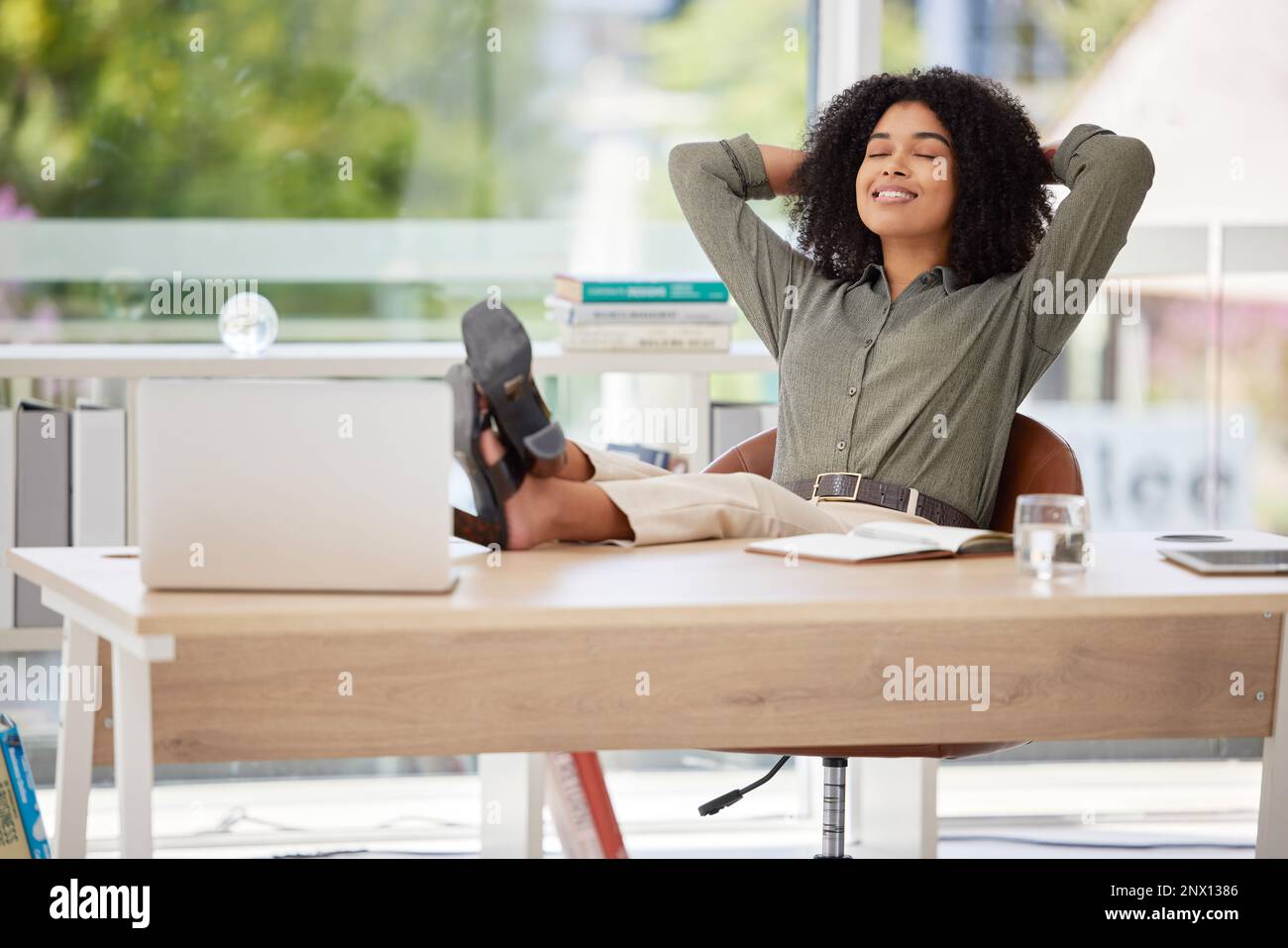 Business, black woman in office or rest after productivity, peace or ...