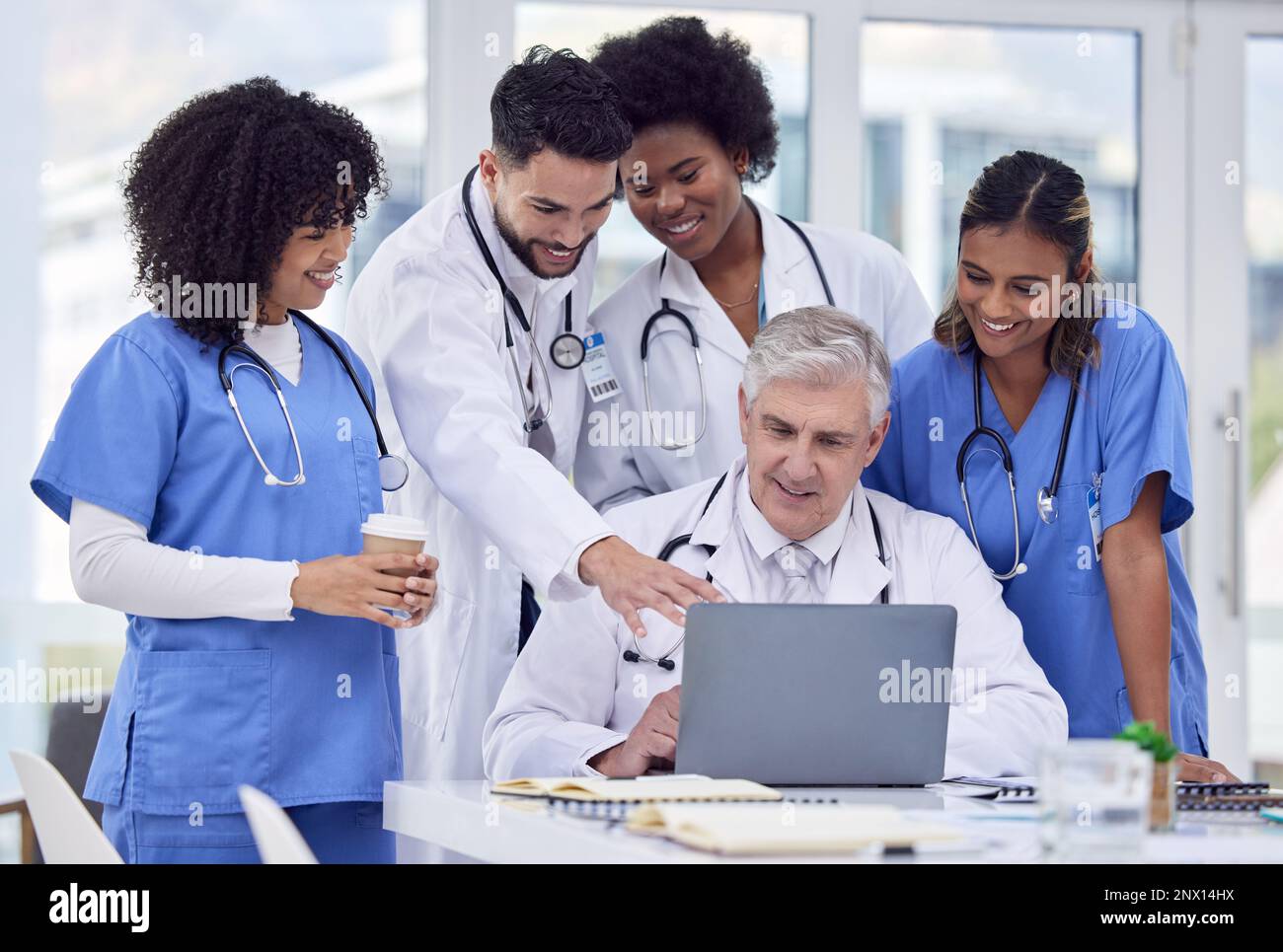 Healthcare, talking and doctors with laptop for analysis, learning and ...