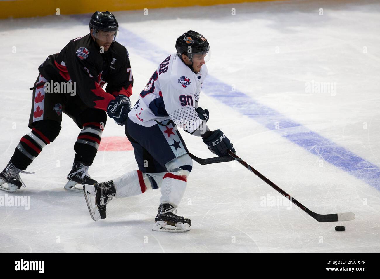 SYDNEY, NSW - JUNE 30: USA player John Dunbar (90) skates down the ice ...