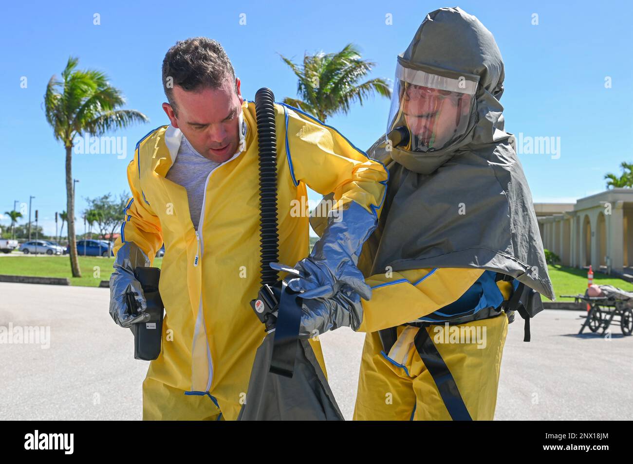 U.S. Air Force Airmen from the 36th Medical Group apply decontamination ...